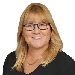 Julie Regan | Traded Profile