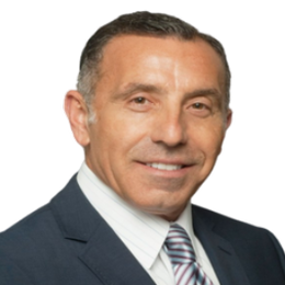 Tony Azzi | Traded Profile